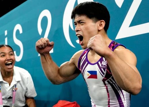 Gymnast Carlos Yulo becomes the second Filipino Olympic gold medalist ...